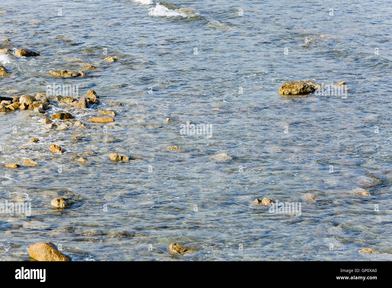 Rocks in the water Stock Photo - Alamy