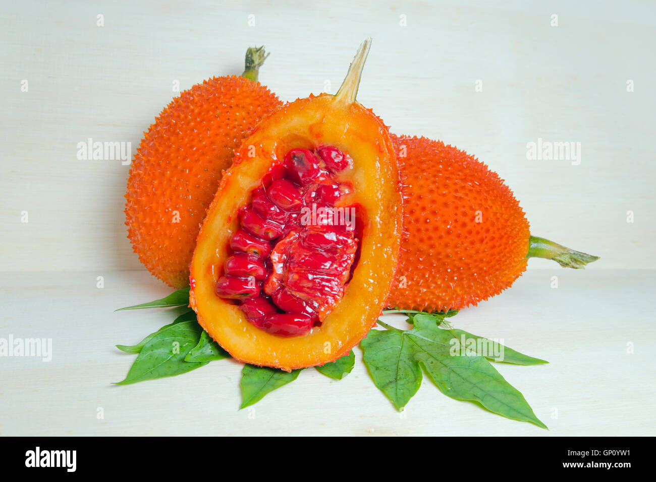 Gac Fruit on wood (Also named as Baby Jackfruit, Spiny Bitter Gac ...