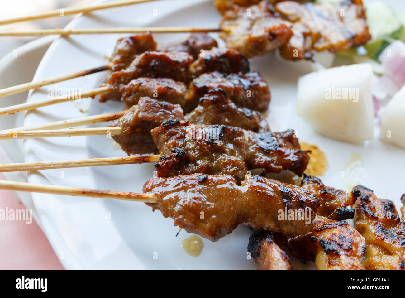 Plate of satay food, Singapore Stock Photo - Alamy
