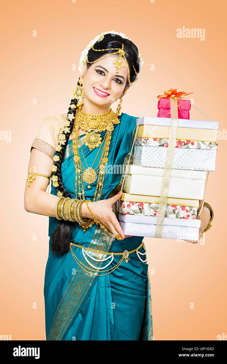 1 Beautiful Adult Bride Tamil Woman Diwali gift showing Stock Photo - Alamy