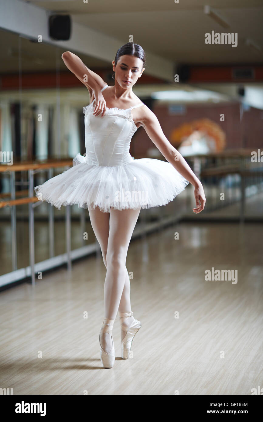 Gracious ballerina dancing in repetition class Stock Photo - Alamy