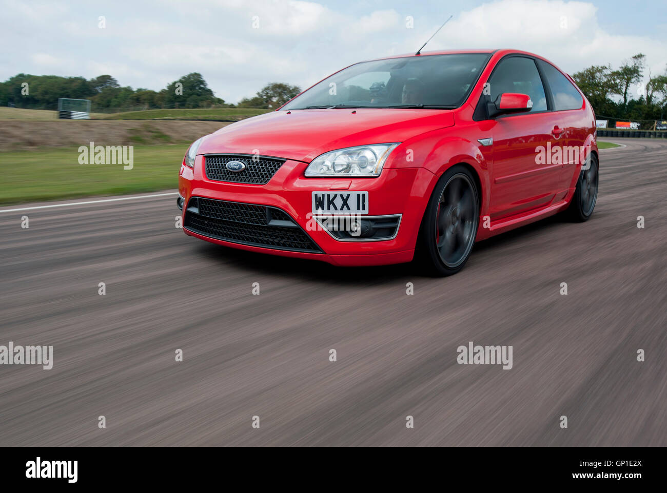 2nd Generation Ford Focus ST high performance hot hatch car driving on ...