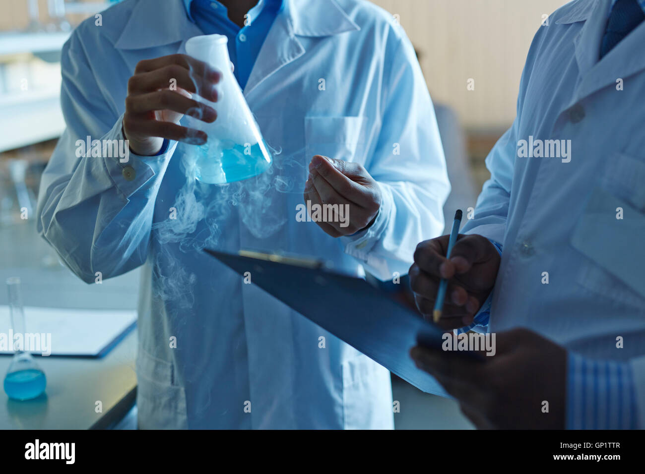 Lab coats clipboard hi-res stock photography and images - Alamy