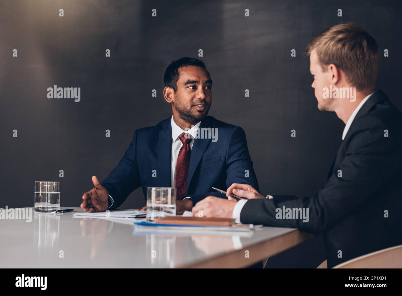 Corporate executives at work in the boardroom Stock Photo - Alamy