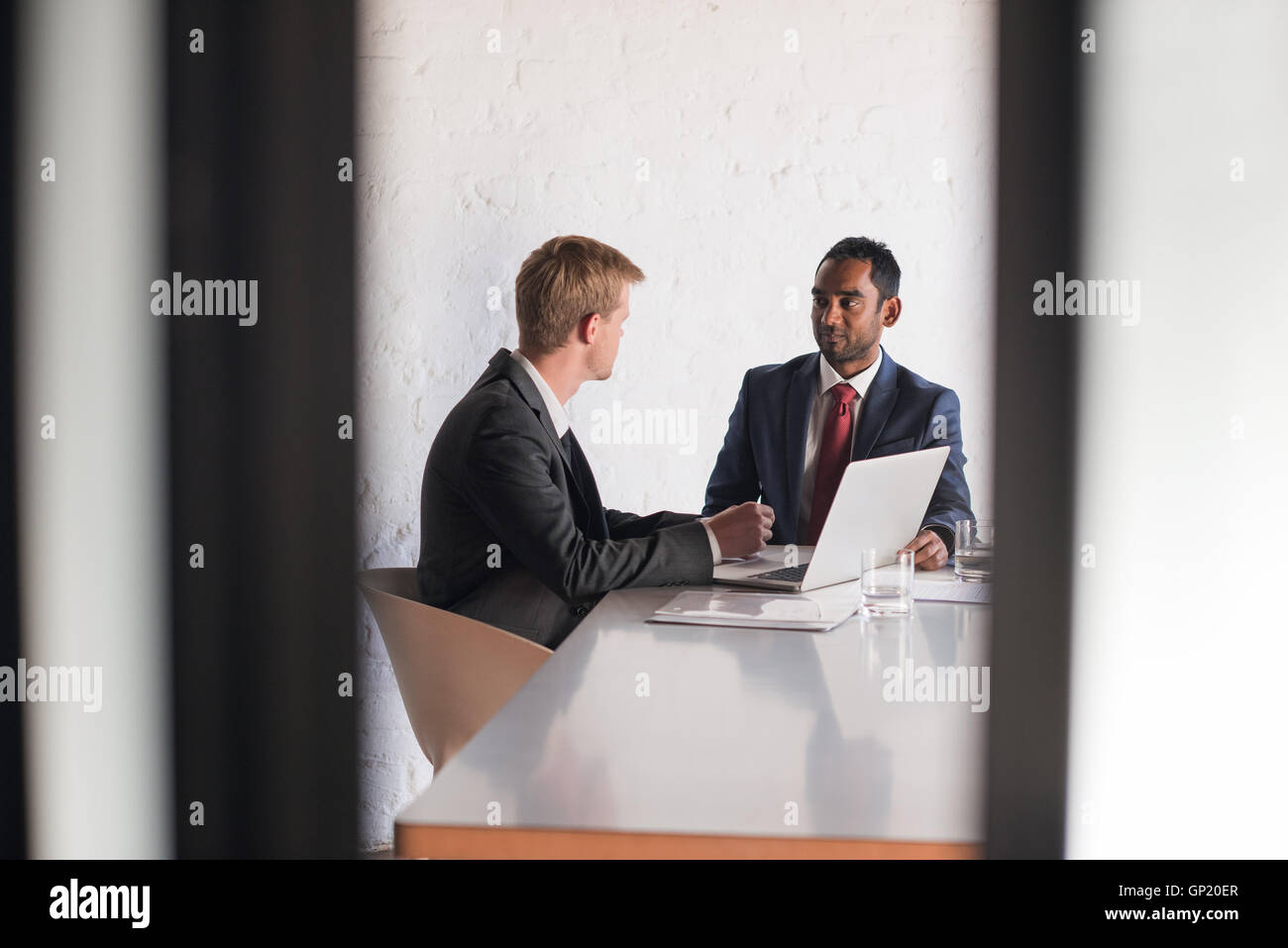 Talking through the online facts and figures Stock Photo - Alamy