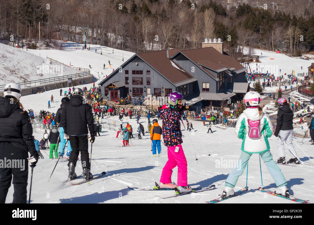 WARREN, VERMONT, USA - Crowd of skiers and lodge, Sugarbush Ski Area ...