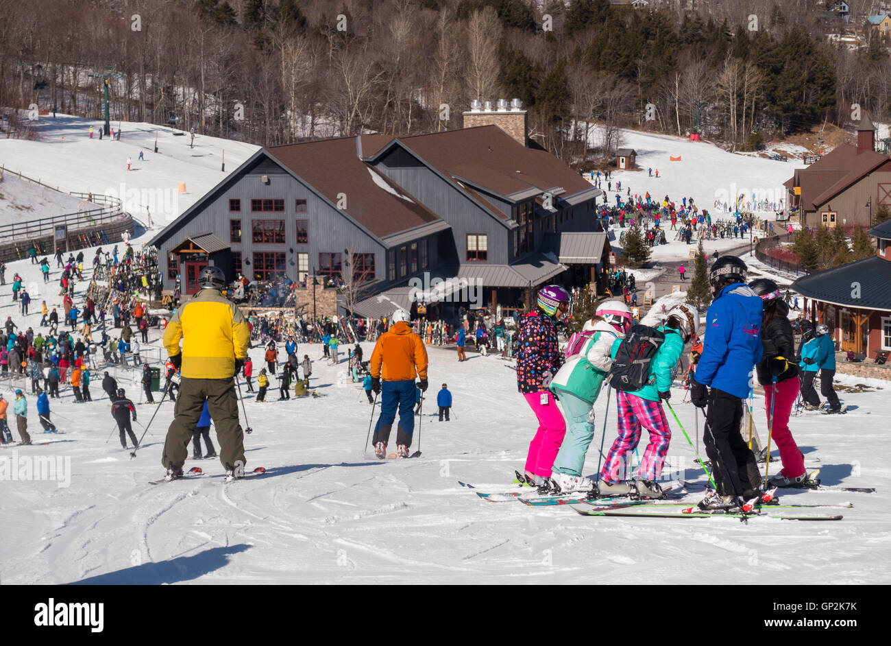 WARREN, VERMONT, USA - Crowd of skiers and lodge, Sugarbush Ski Area ...