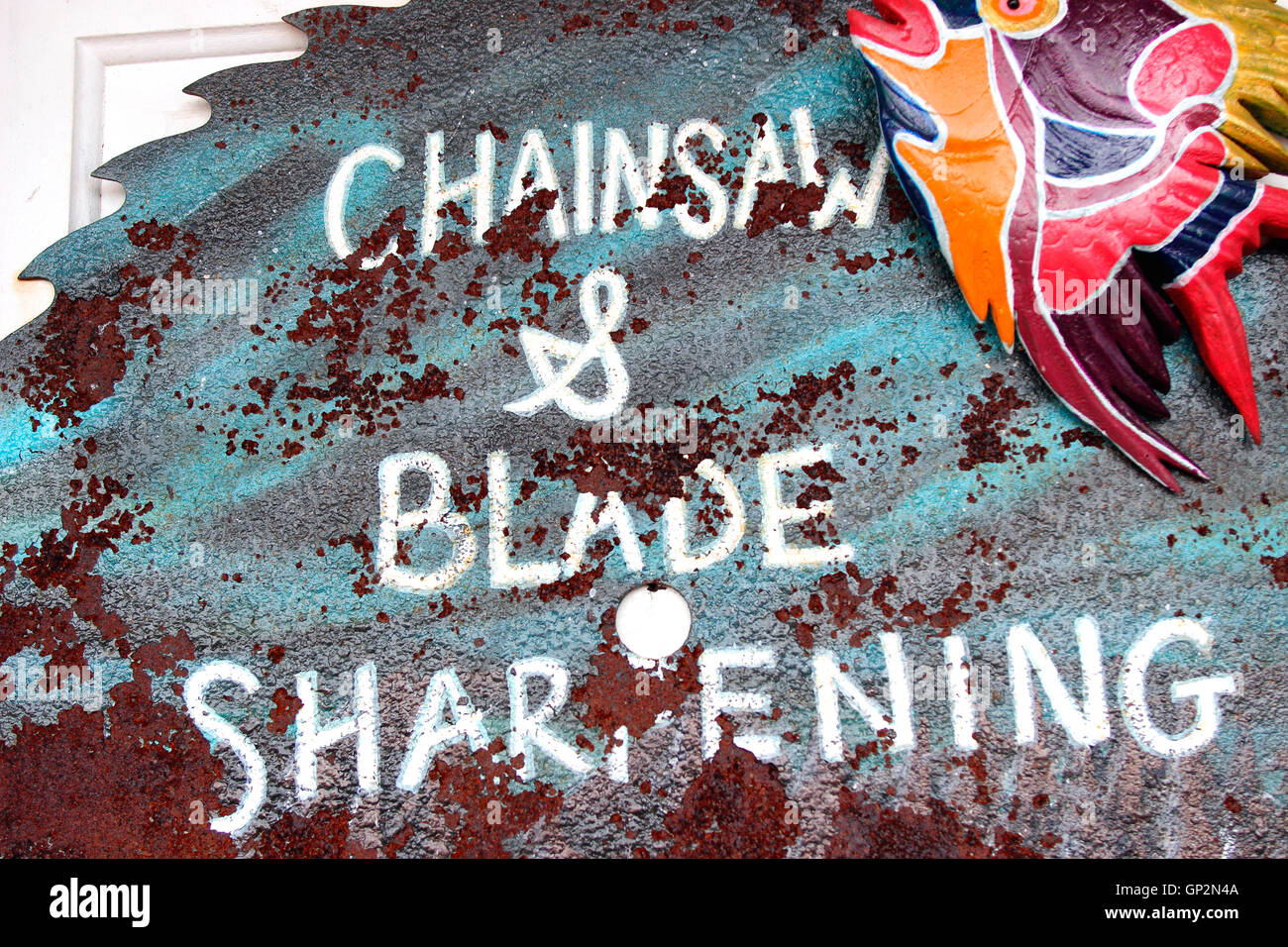 Chainsaw blade sharpening shop sign Thomas Basin fishing fleet boats ...