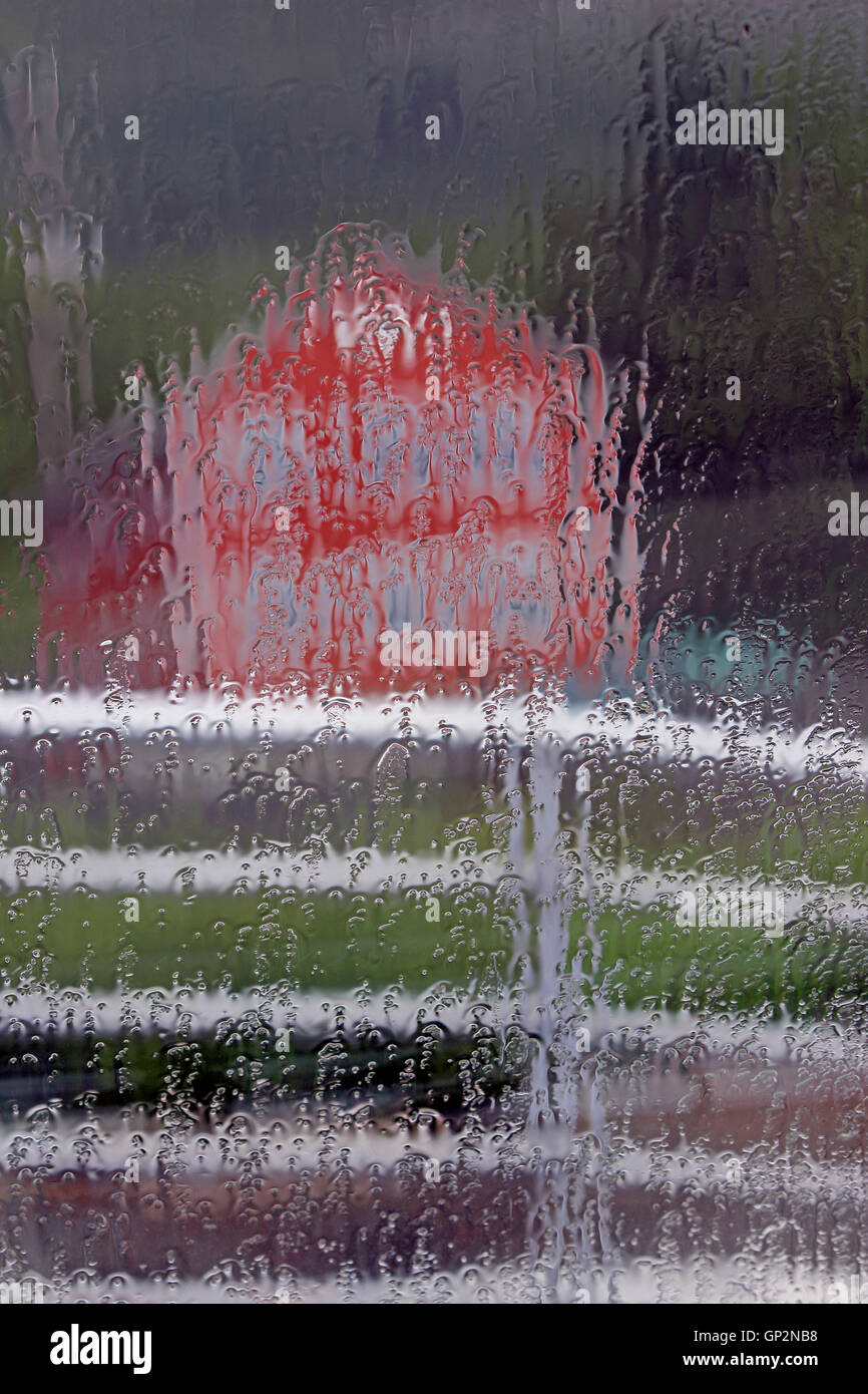 Rain on glass red building abstract boat window Alaska Inside Passage ...