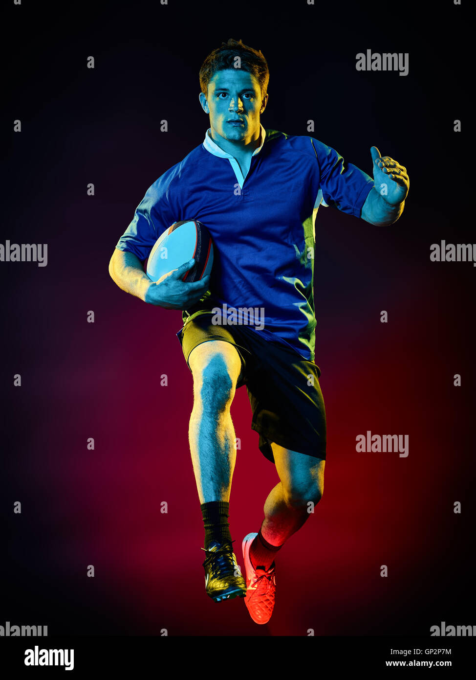 one caucasian rugby man player on colorful black background Stock Photo ...