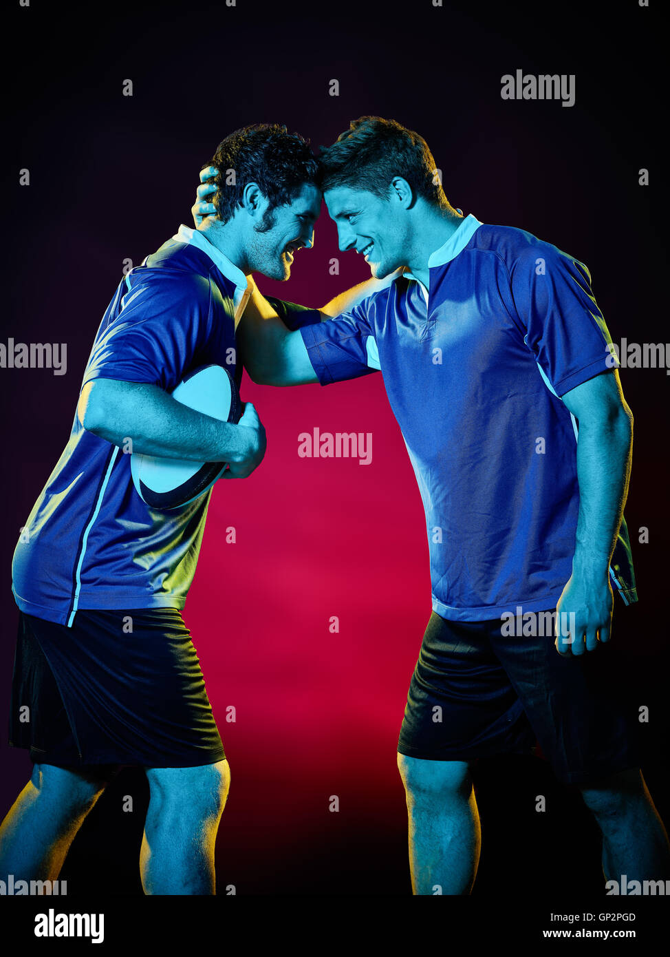 two caucasian rugby men players on colorful black background Stock ...