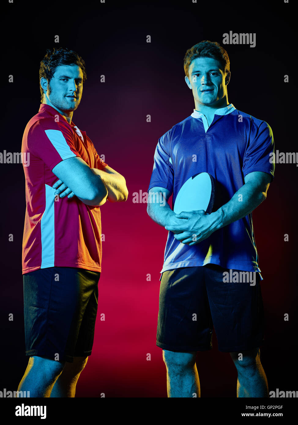 two caucasian rugby men players on colorful black background Stock ...