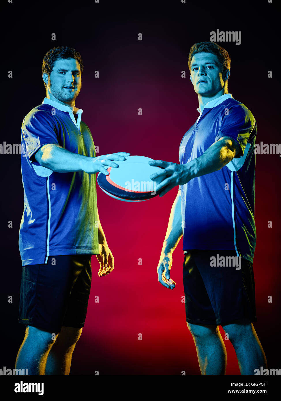 two caucasian rugby men players on colorful black background Stock ...