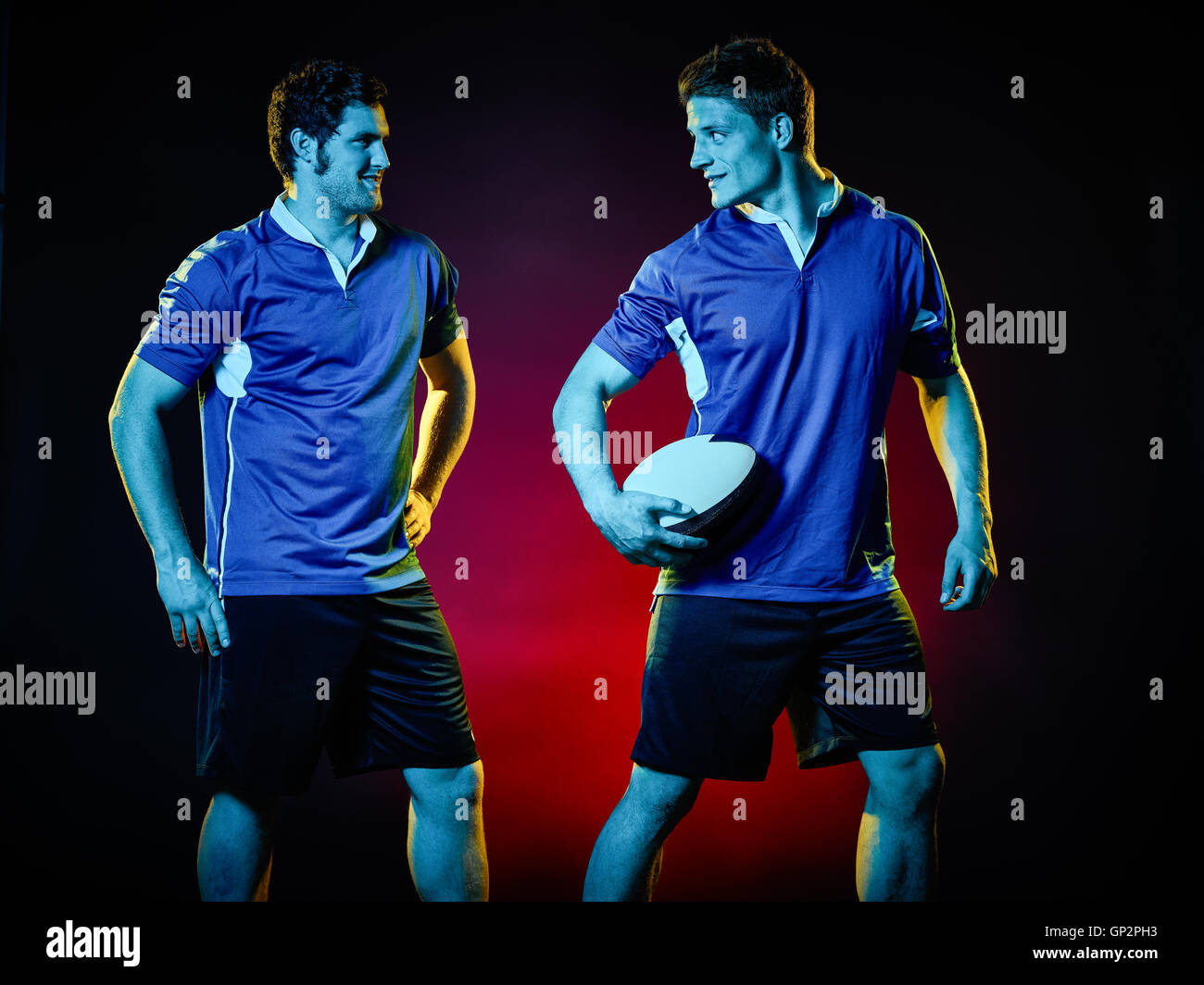 two caucasian rugby men players on colorful black background Stock ...