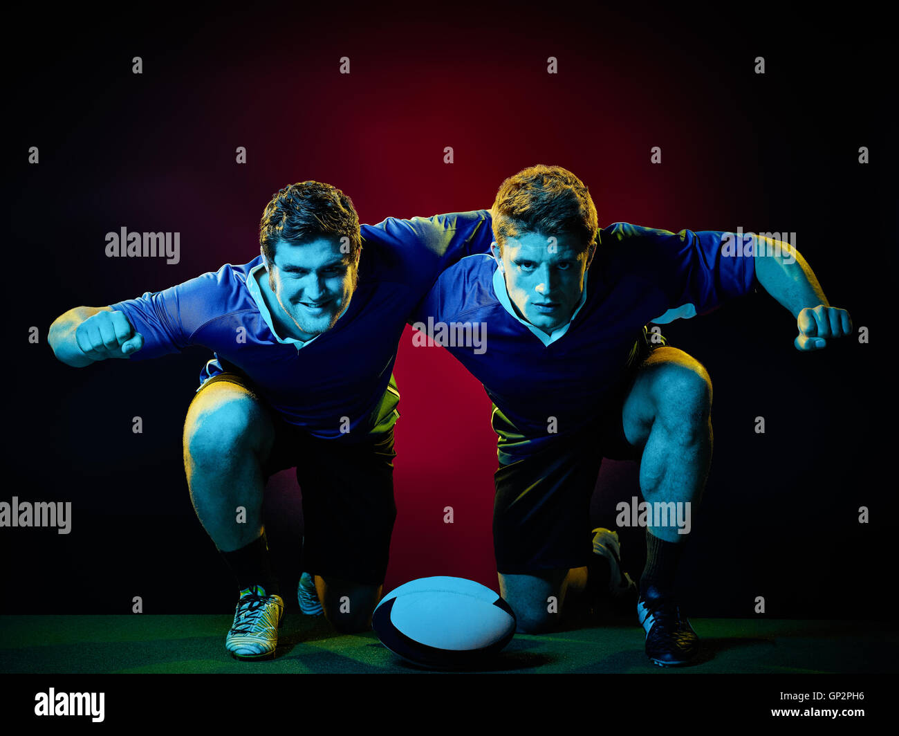 two caucasian rugby men players on colorful black background Stock ...