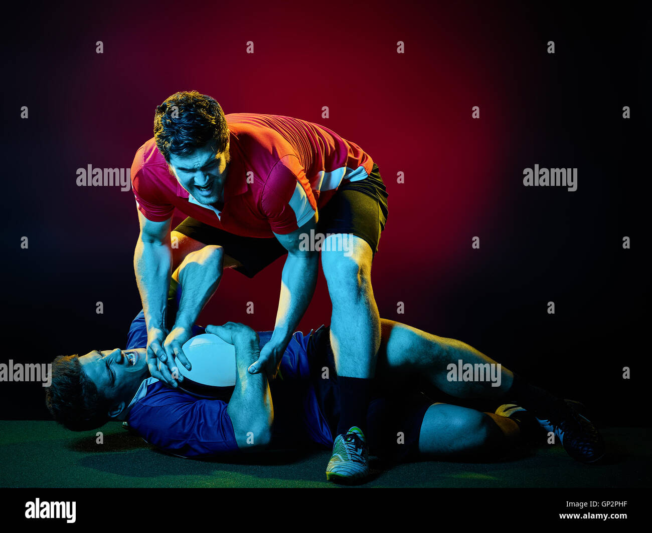 two caucasian rugby men players on colorful black background Stock ...