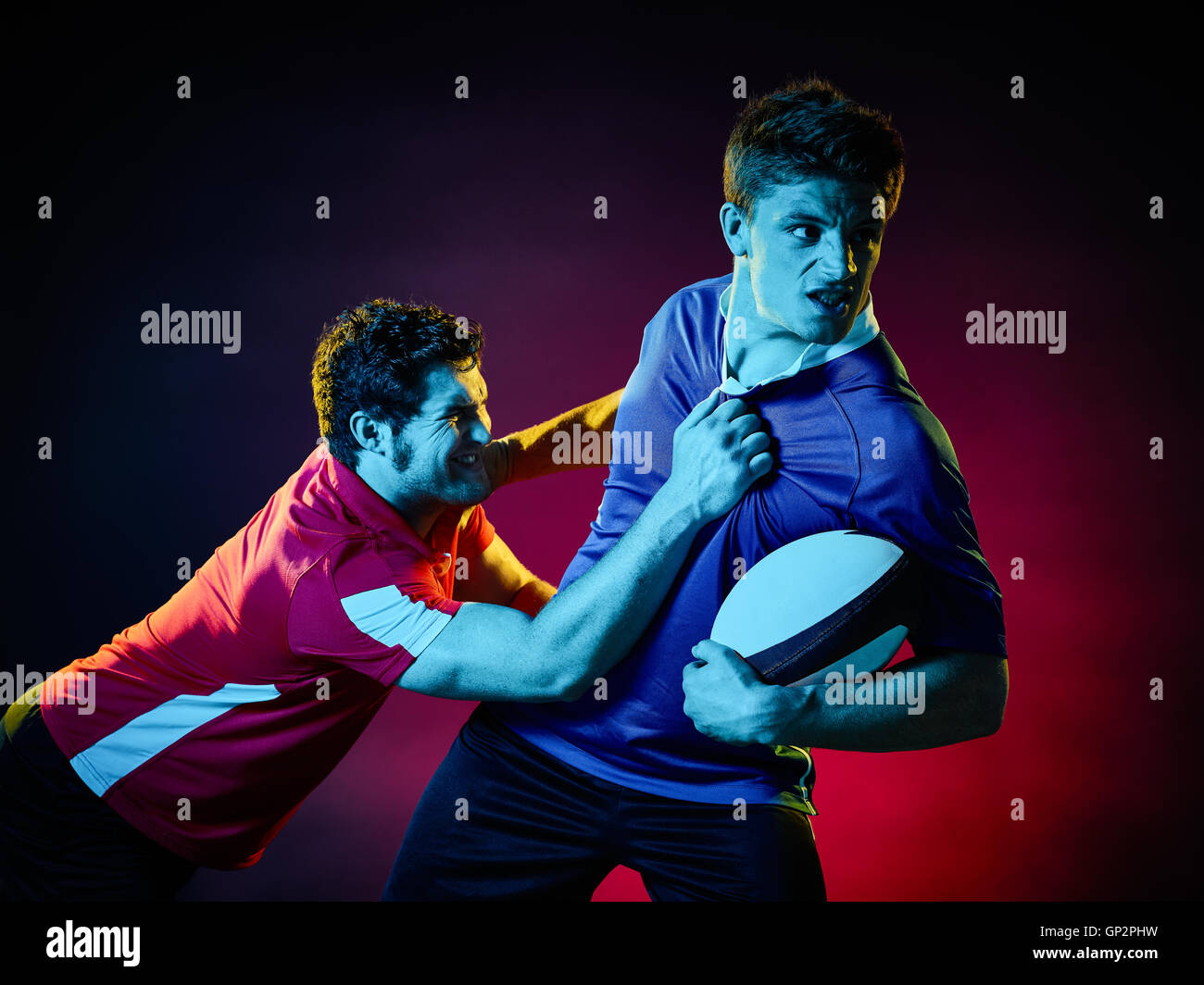 two caucasian rugby men players on colorful black background Stock ...