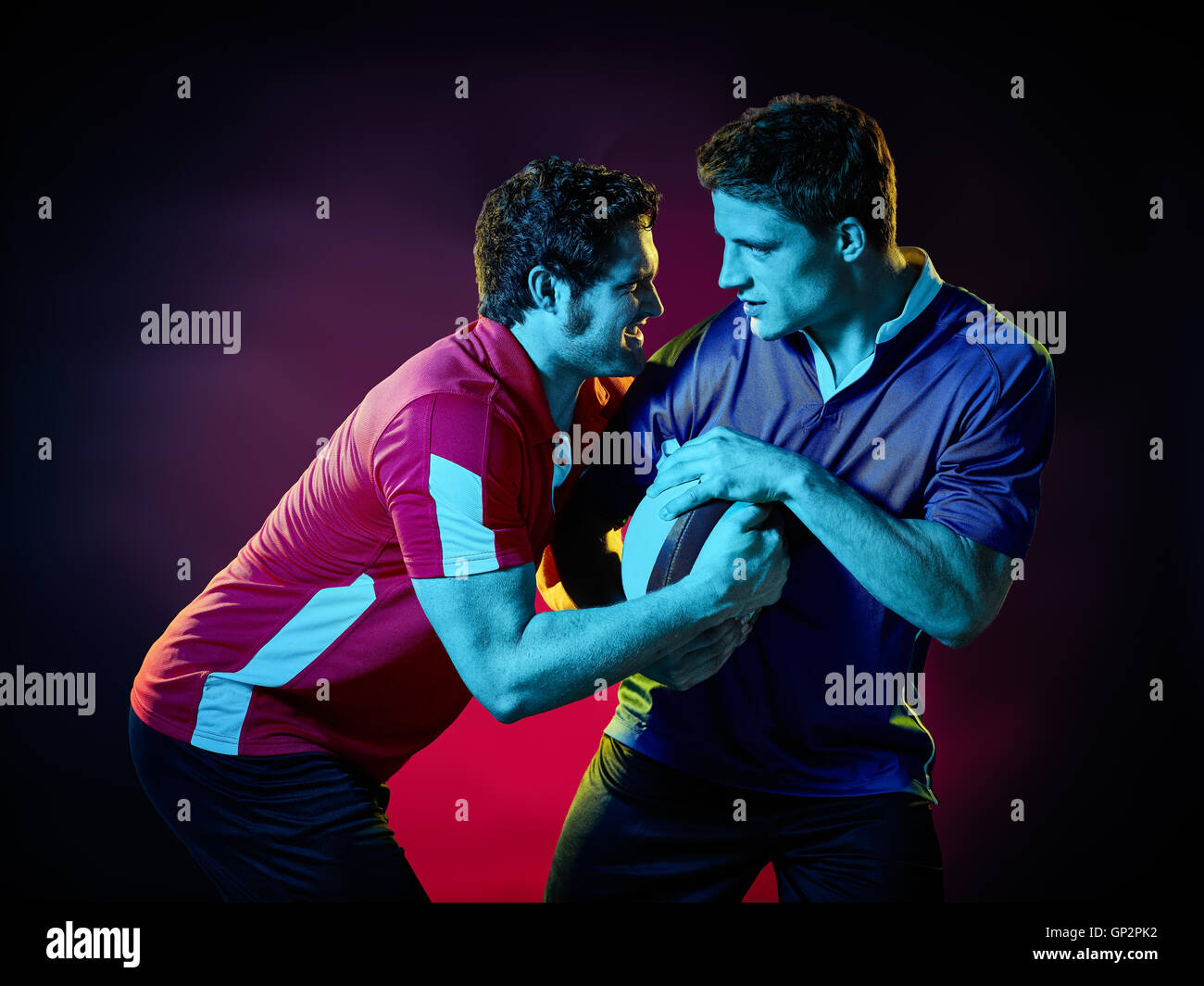 two caucasian rugby men players on colorful black background Stock ...