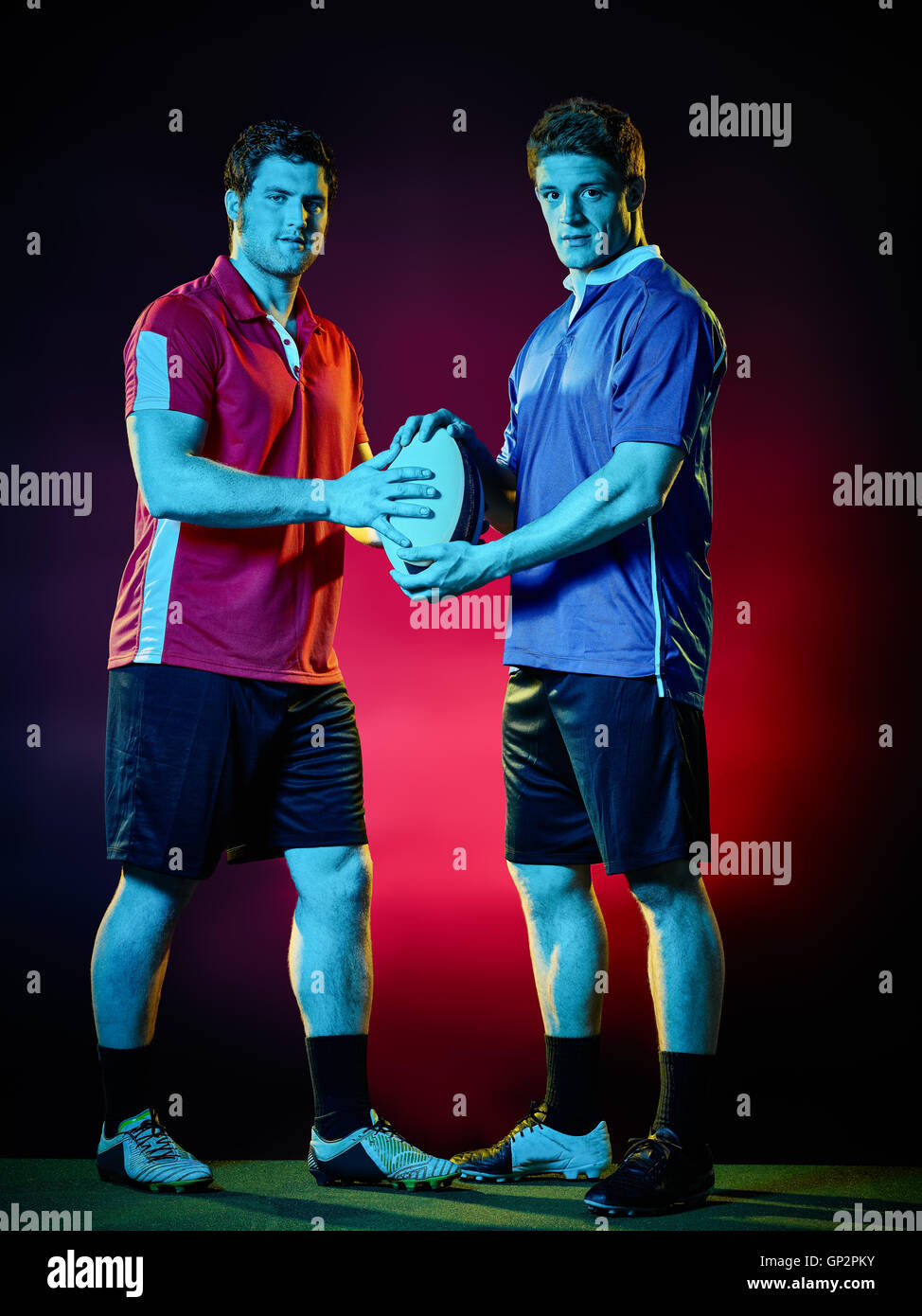 two caucasian rugby men players on colorful black background Stock ...