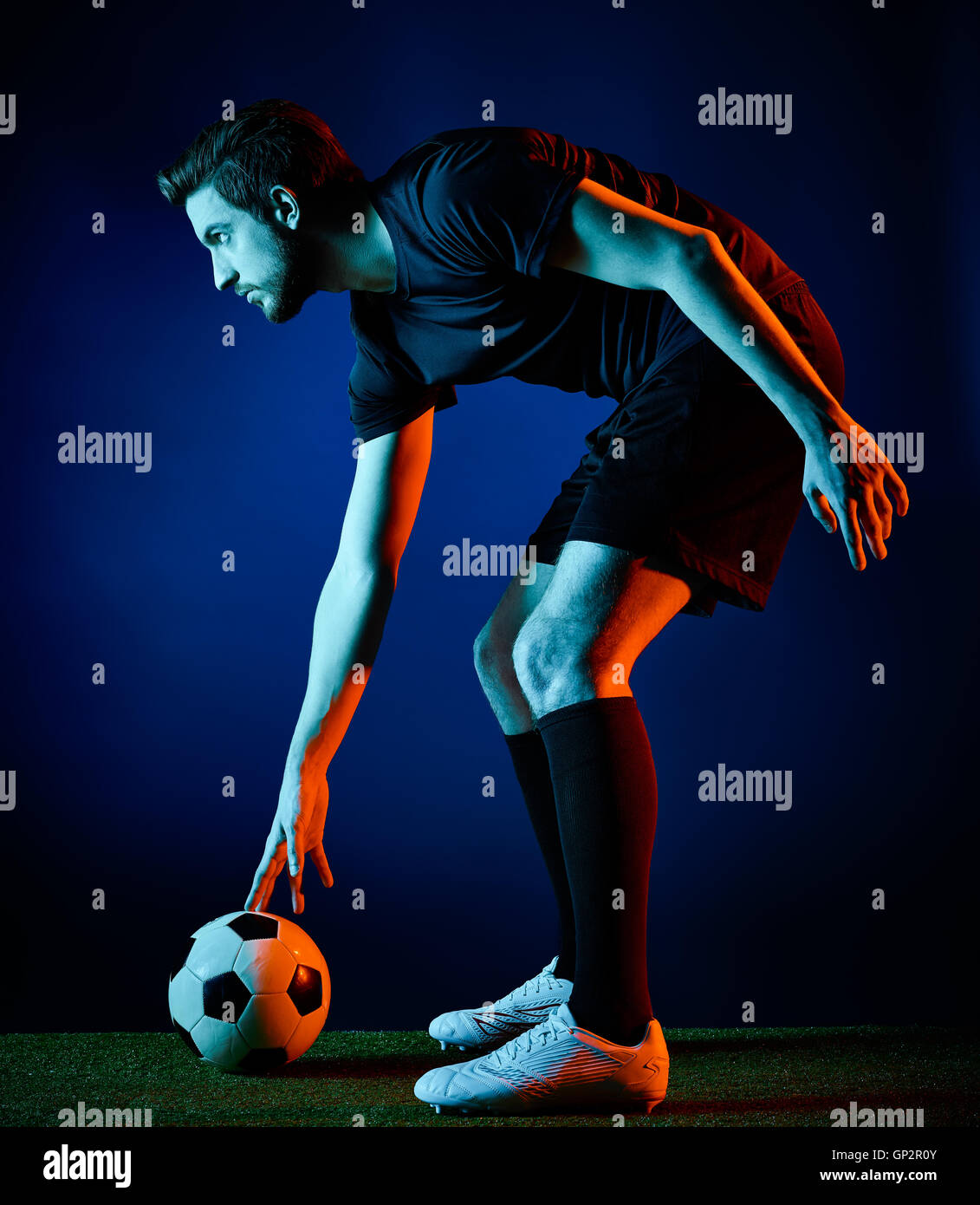 one caucasian Soccer player Man isolated on black backgound Stock Photo ...