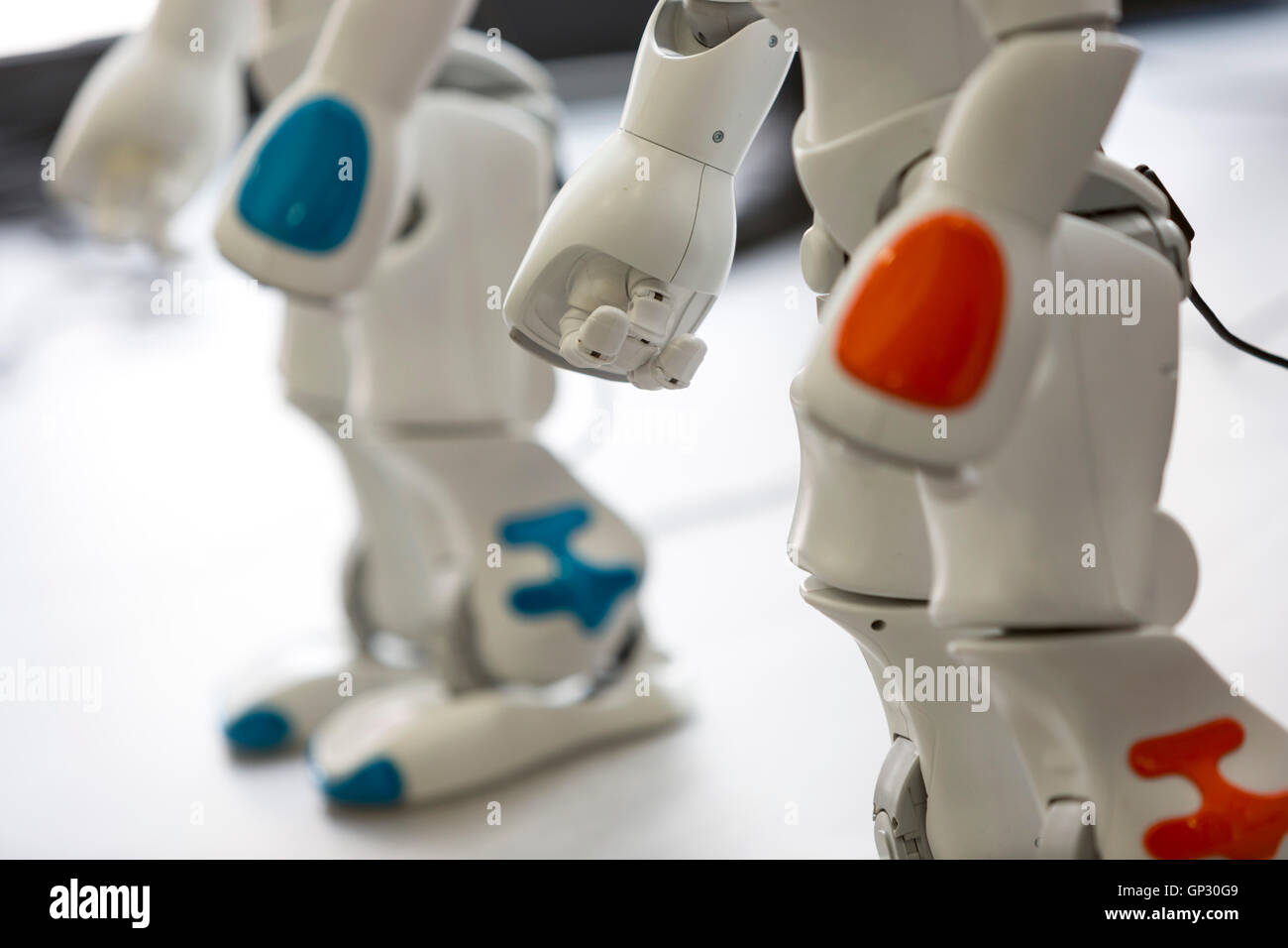 A small robot with human face and body - humanoid. Artificial ...