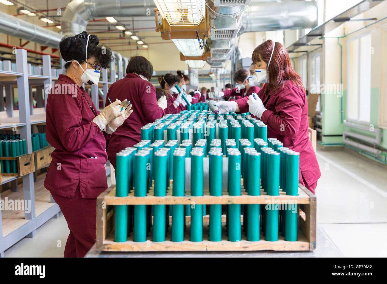Sopot, Bulgaria - May 17, 2016: Arsenal women workers are producing ...