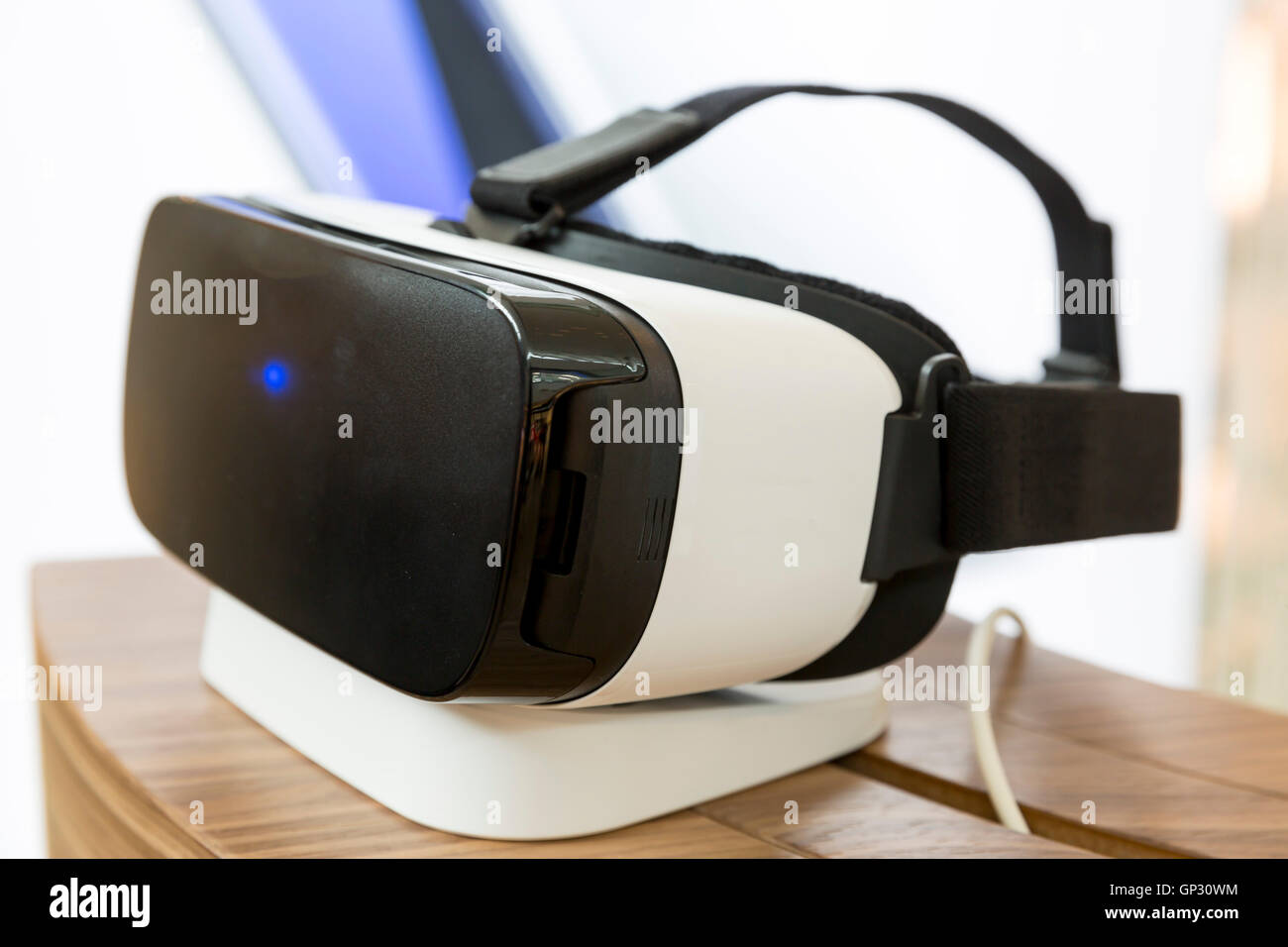 Virtual reality (VR) headsets (glasses) on a table. VR is immersive ...