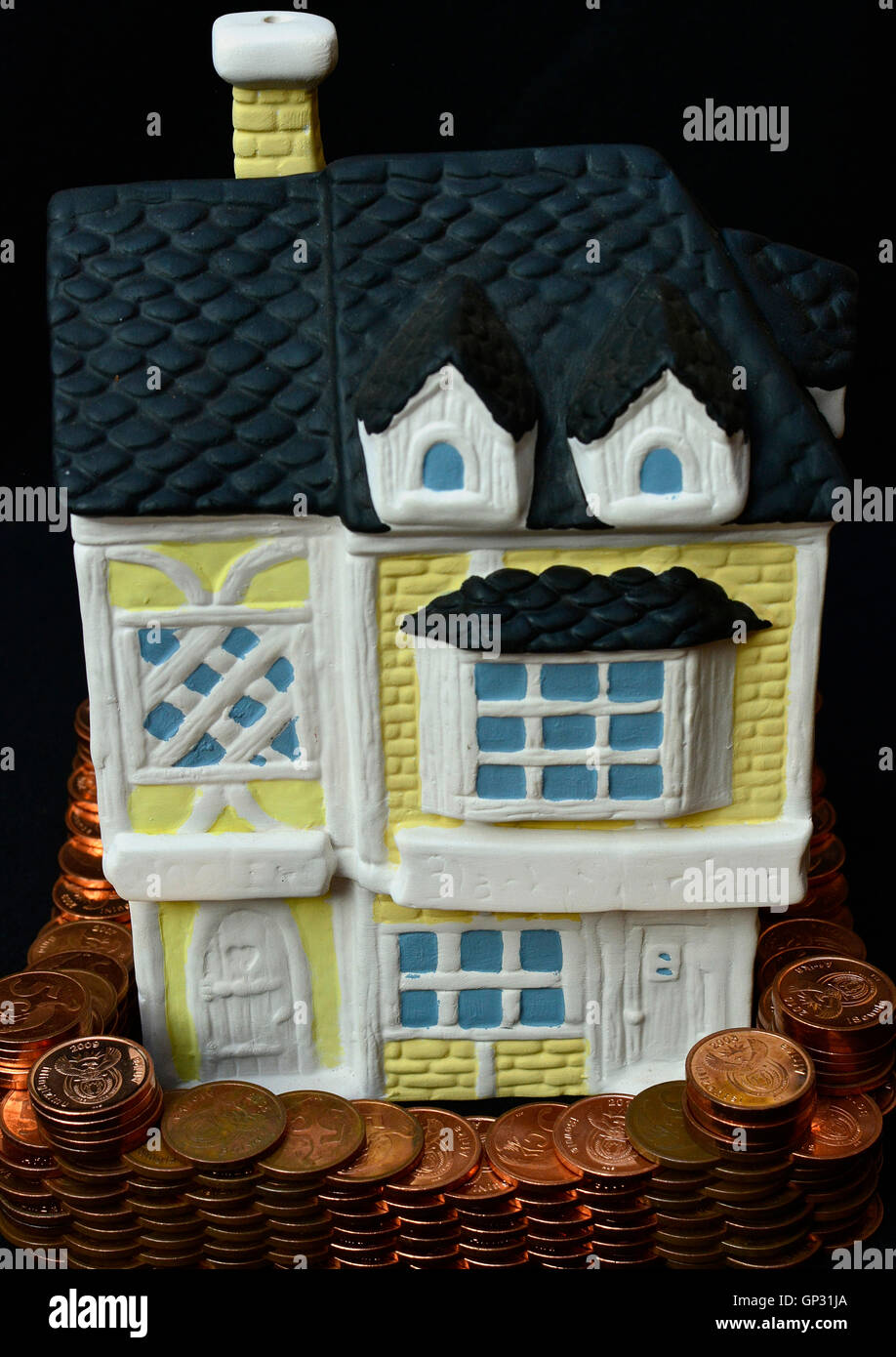 Protected real estate investment concept. House protected by a money ...