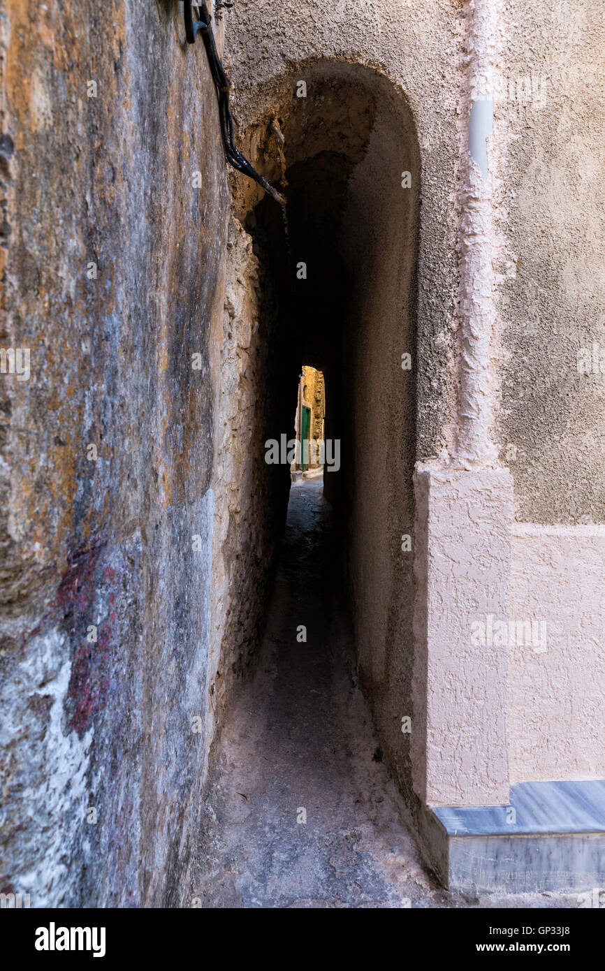 Very narrow street in the village of Pirgi in Chios Island, Greece ...