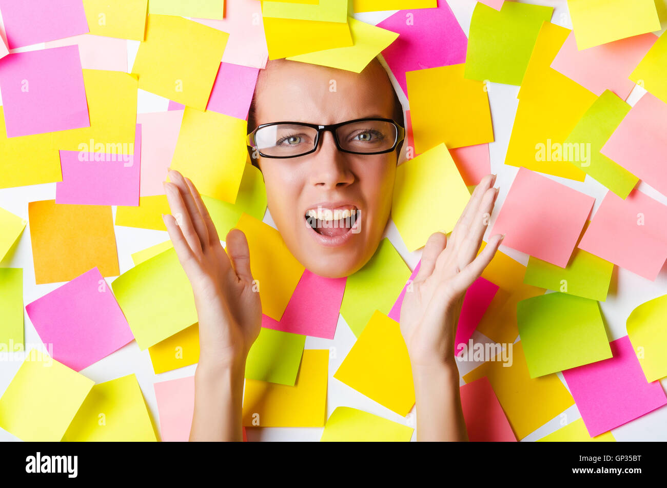 Woman with lots of reminder notes Stock Photo - Alamy
