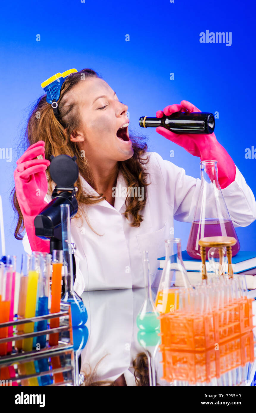 Funny female chemist in lab Stock Photo - Alamy