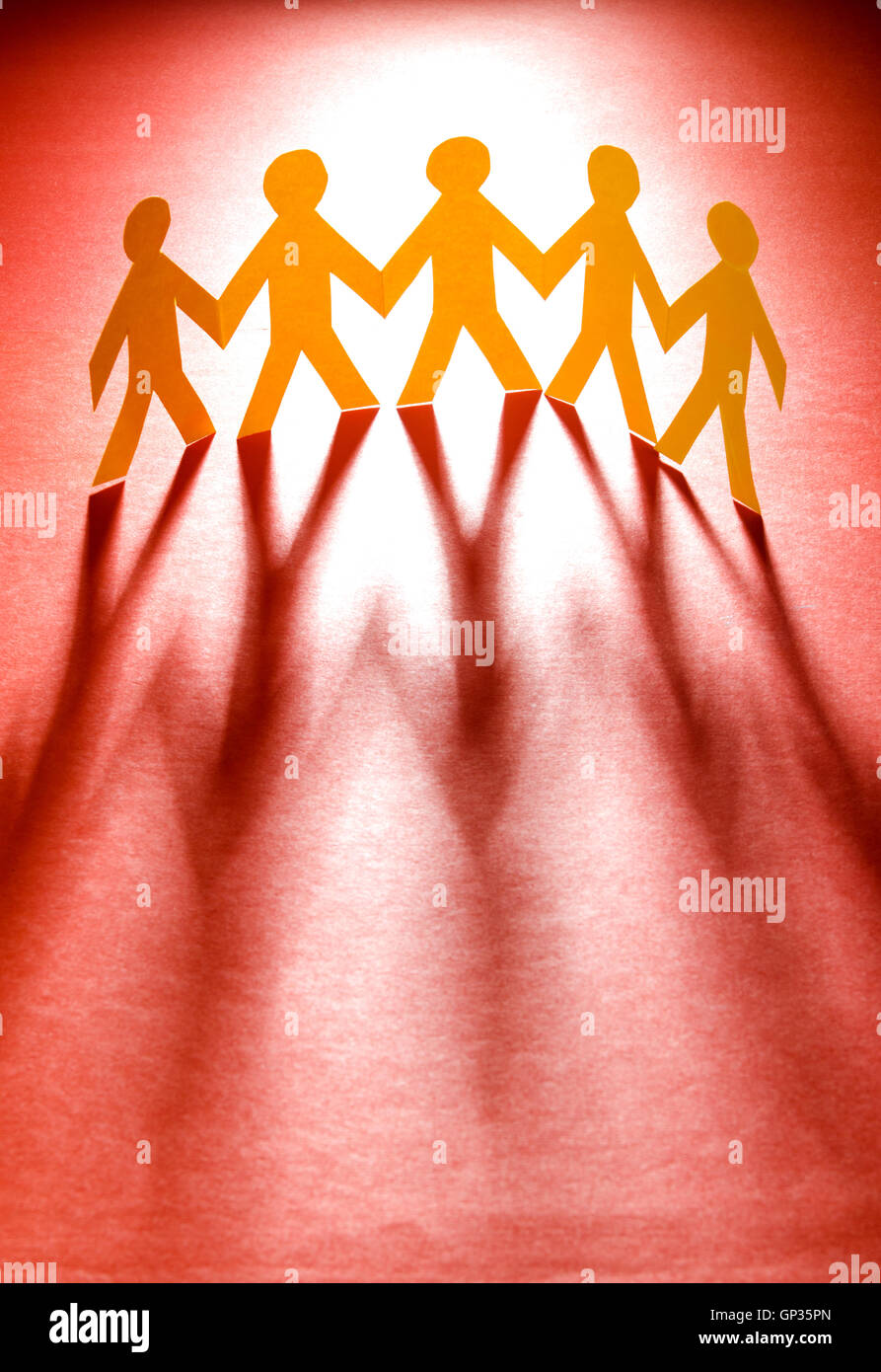 Paper people in teamworking concept Stock Photo - Alamy