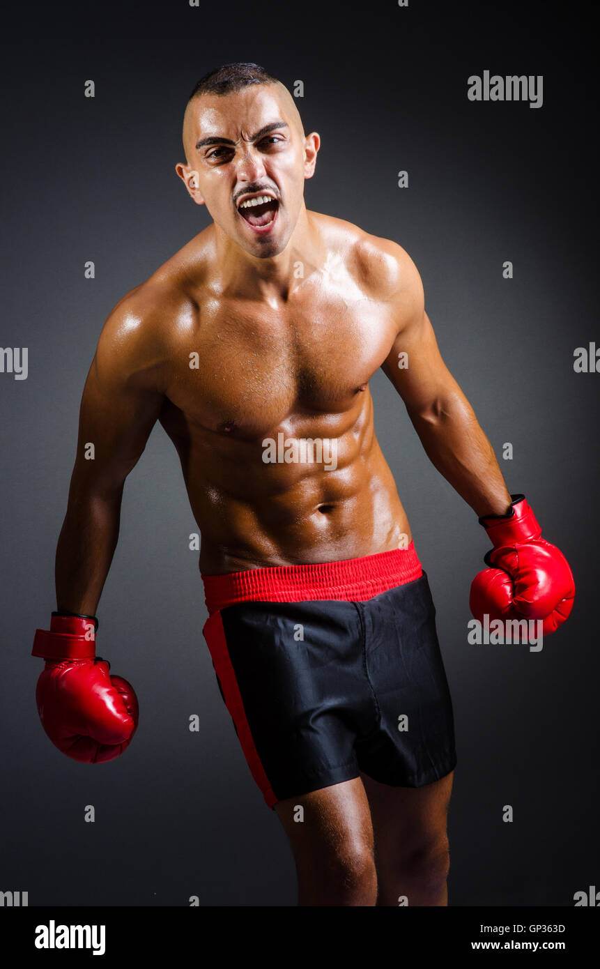 Muscular boxer in studio shooting Stock Photo - Alamy