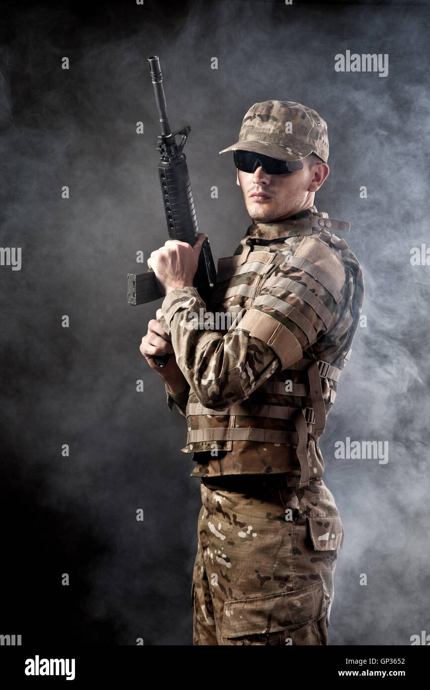 Modern soldier with rifle Stock Photo - Alamy