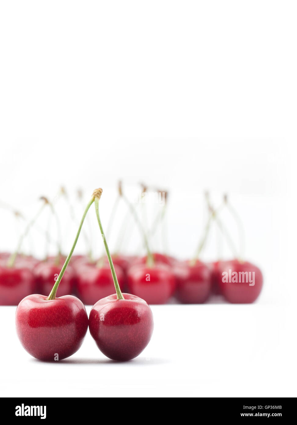 Close up view of two cherries Cut Out Stock Images & Pictures - Alamy