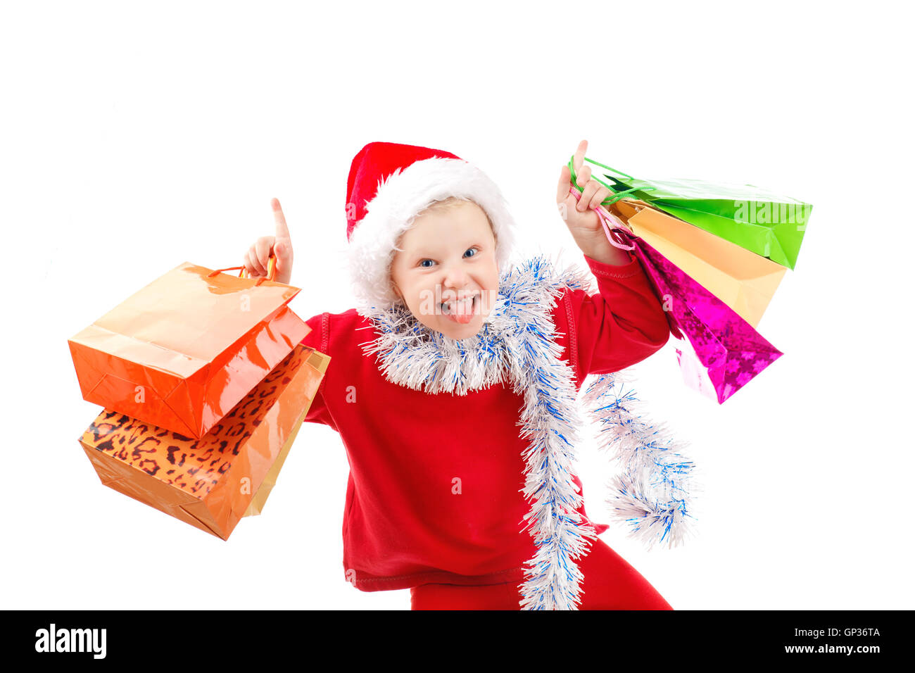 Child dressed as Santa with presents Stock Photo - Alamy