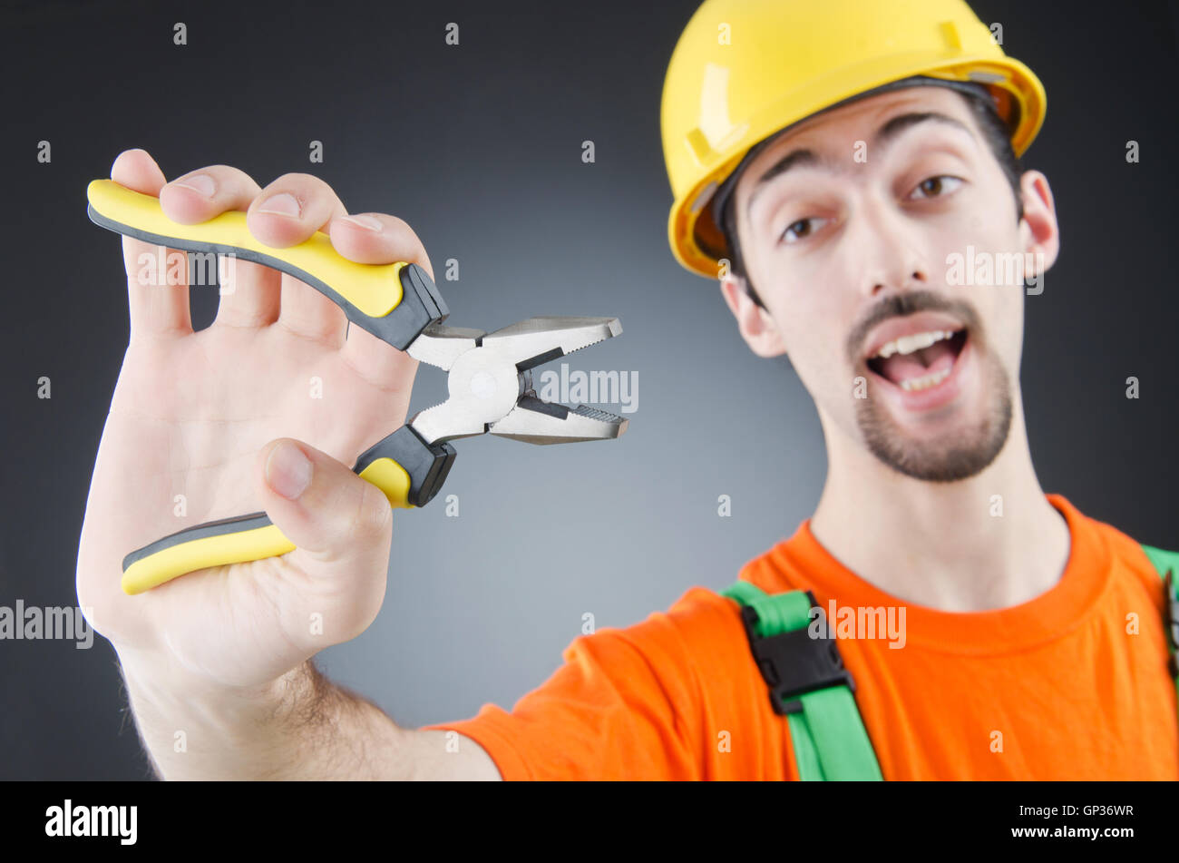 Holding safety tongs hi-res stock photography and images - Alamy