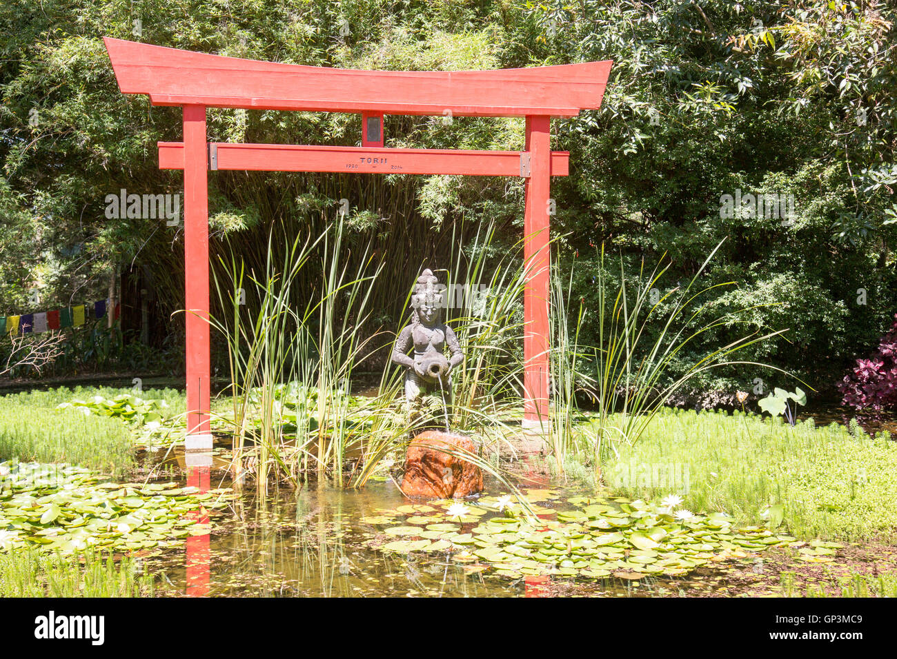 The Water Pourer pond at Crystal Castle and Shambhala Gardens in ...