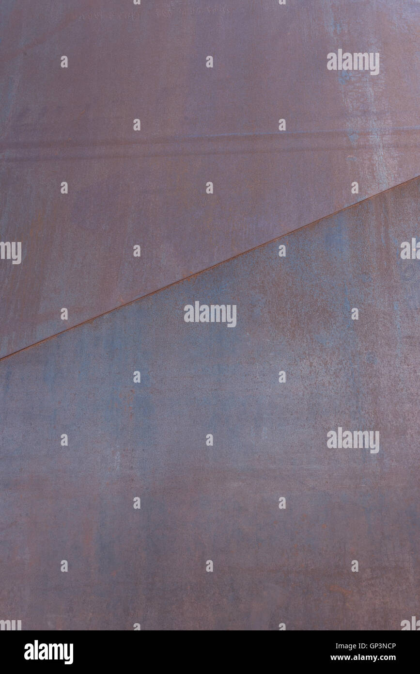 Rusted Steel Panel with Diagonal Seam vertical image Stock Photo - Alamy