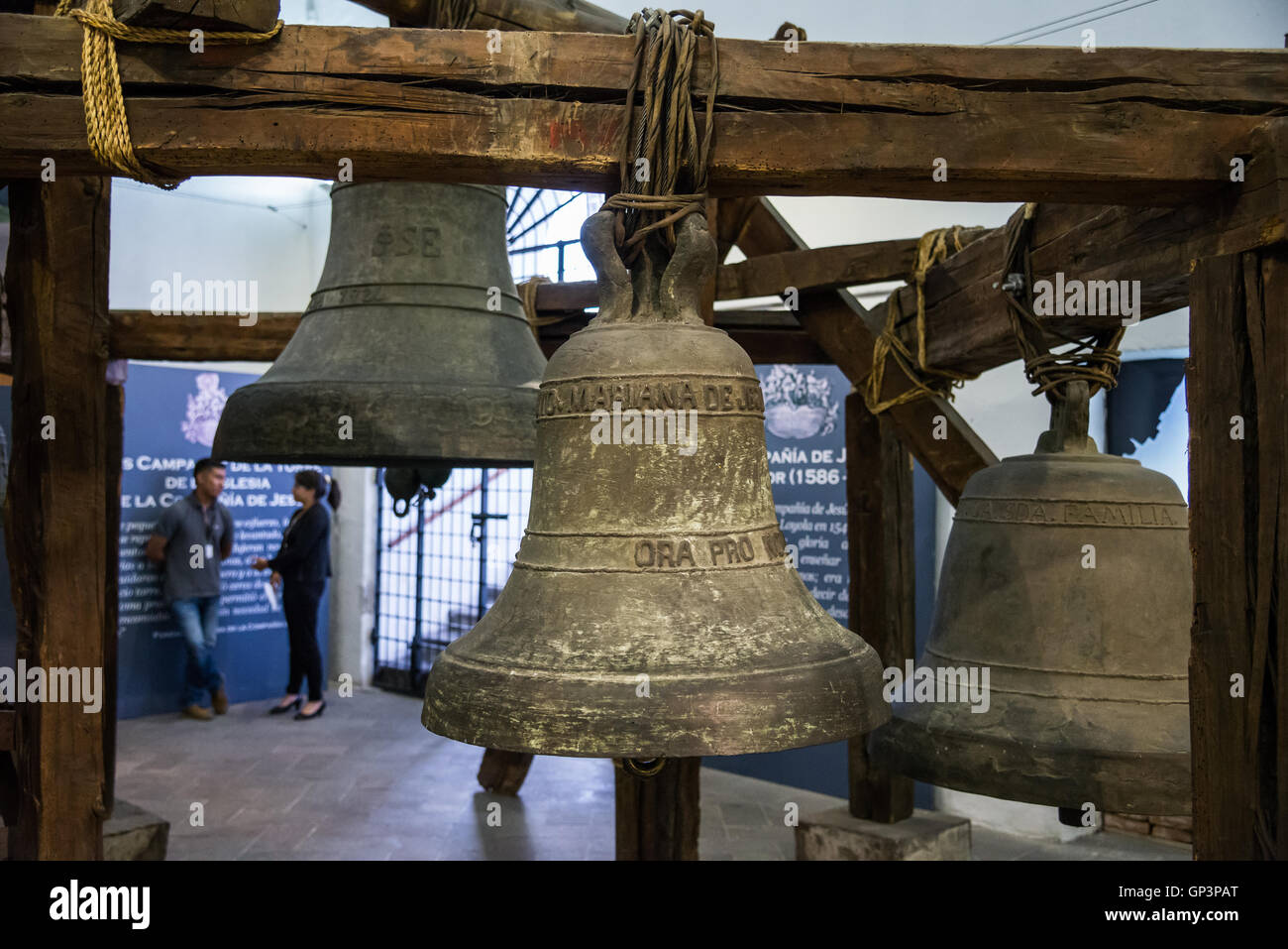 A bronze church bell in display at the Church of El Sagrario in ...