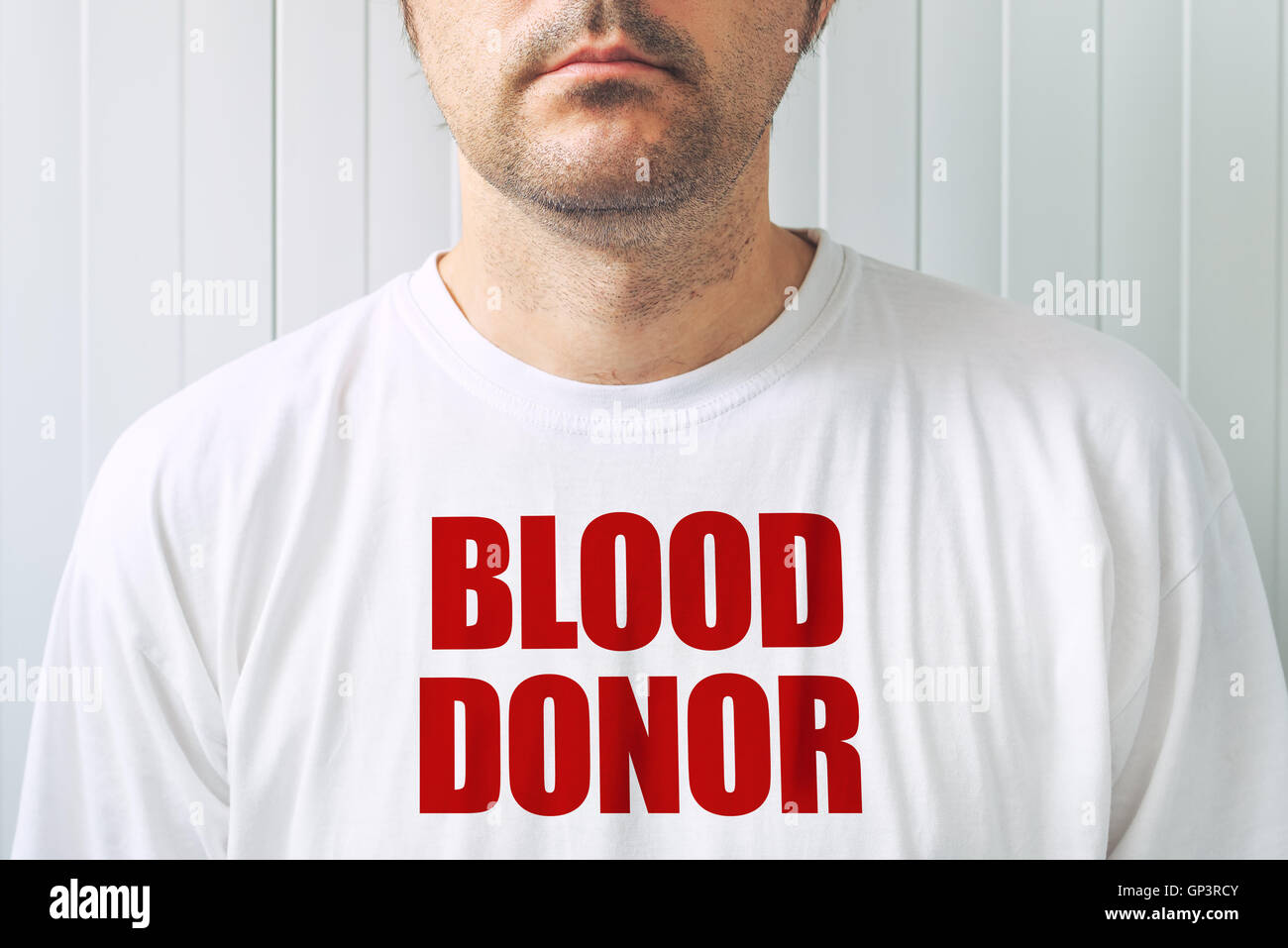 Blood donor, male person posing at camera Stock Photo - Alamy