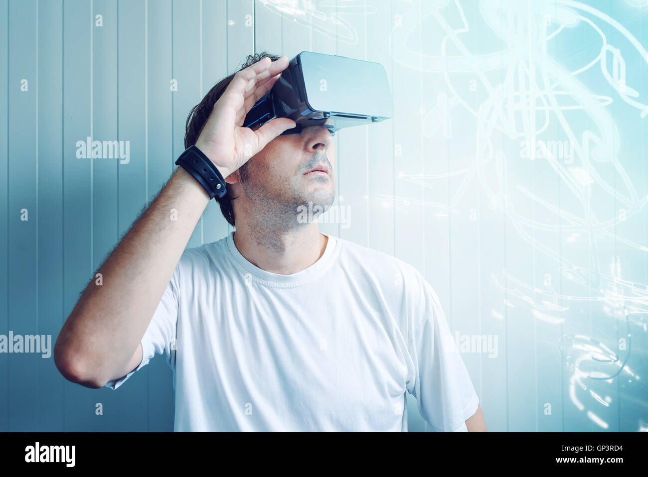 Man exploring virtual reality environment and enjoying multimedia ...