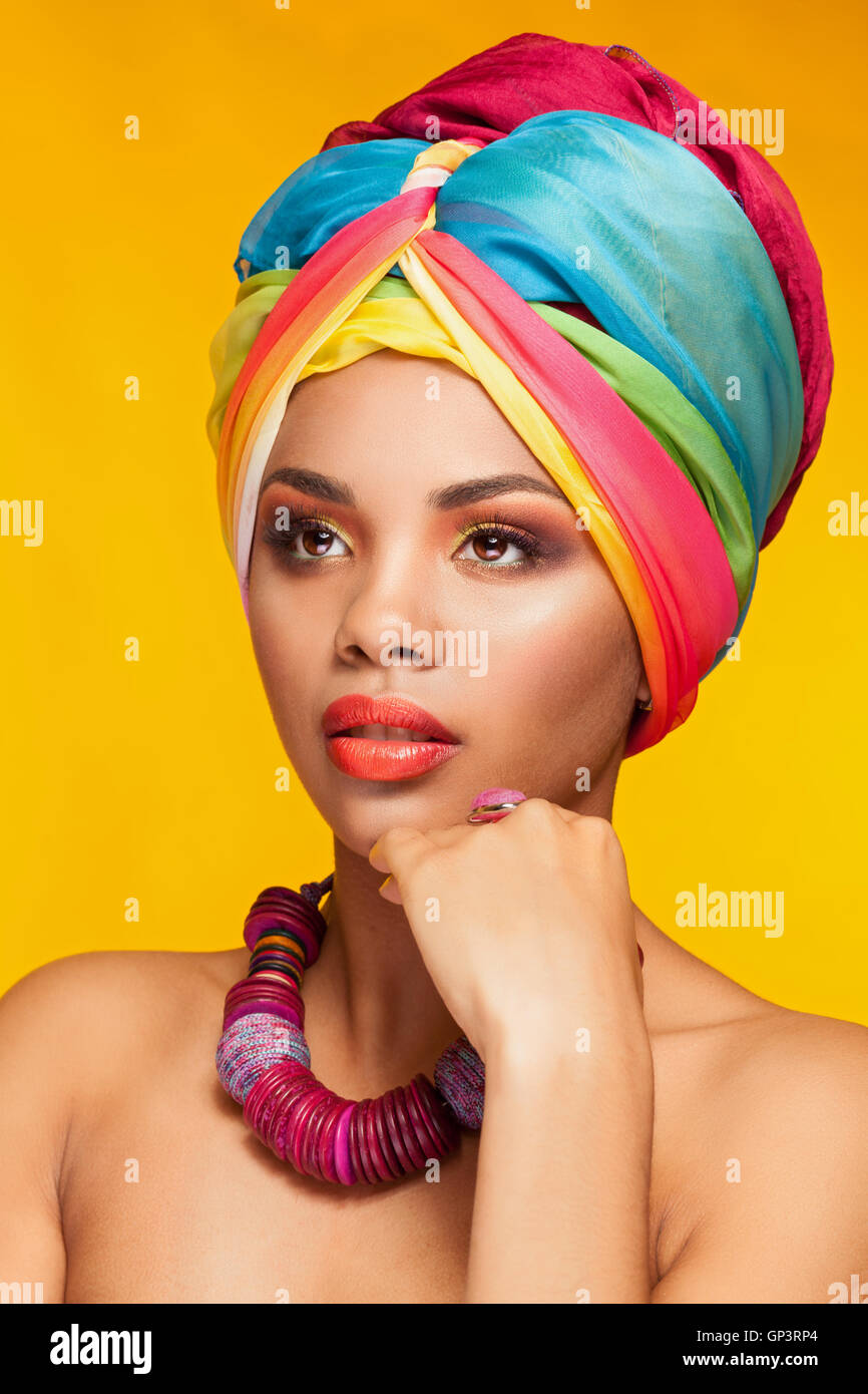 Ethnic afro american woman on yellow background in studio photo Stock ...