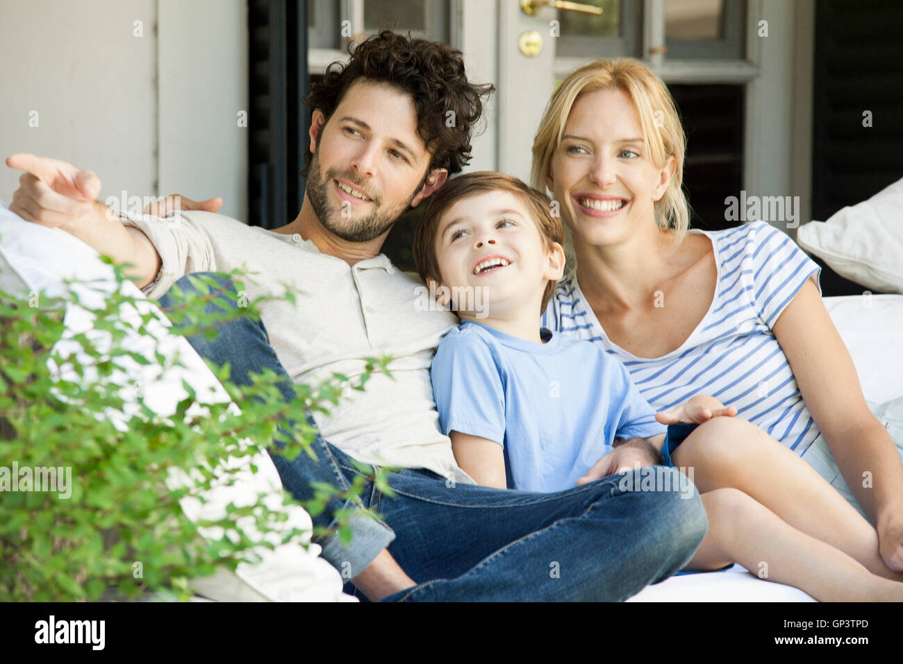Family with one child, portrait Stock Photo - Alamy