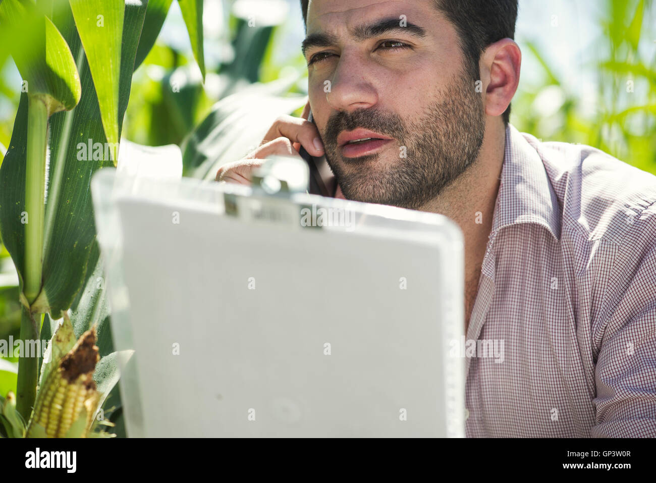 Farmer making phone call in hi-res stock photography and images - Alamy