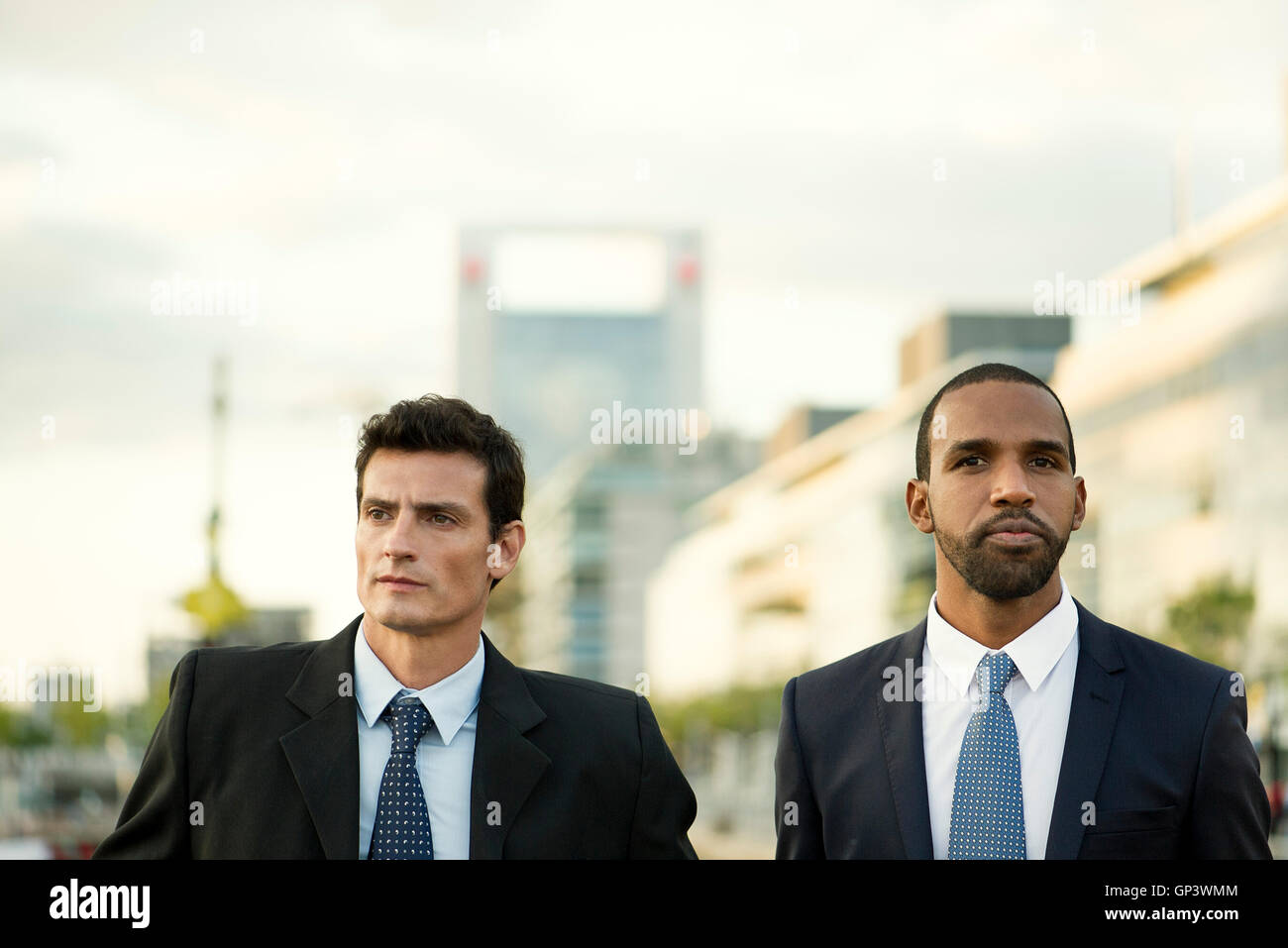 Business colleagues walking together Stock Photo - Alamy