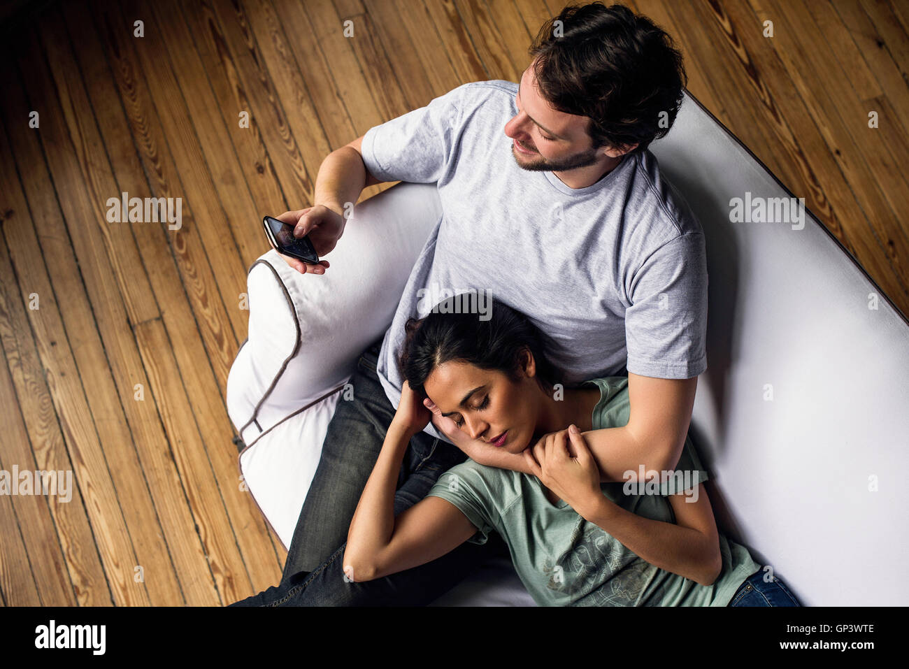 Girlfriend sitting on boyfriends lap hi-res stock photography and ...