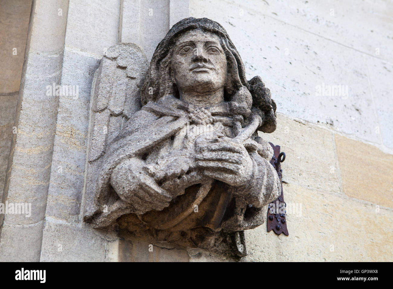 A sculpture on the exterior of Magdalen College in Oxford, England ...