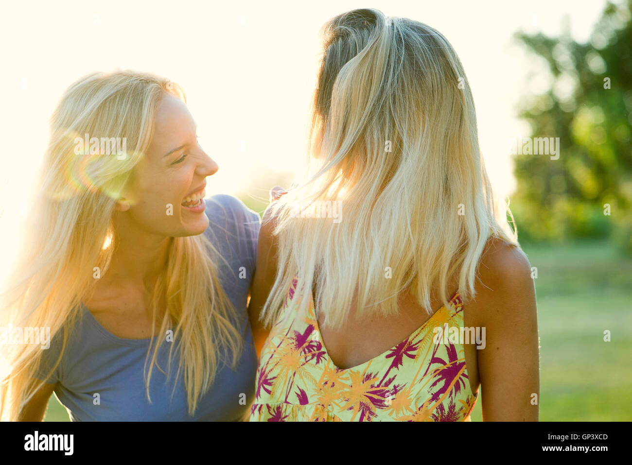 Friends having fun together outdoors Stock Photo - Alamy