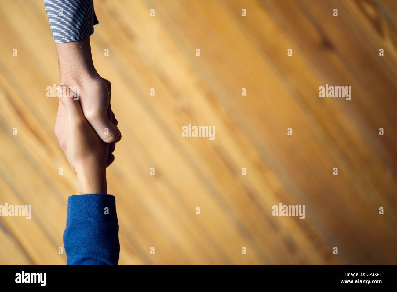 Greeting with handshake Stock Photo - Alamy